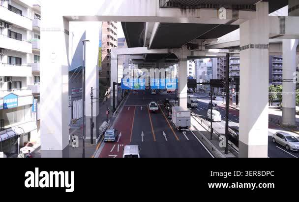 A cityscape of traffic jam at the downtown street in Ikejiri Tokyo ...