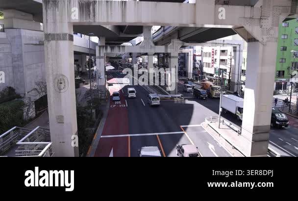 A cityscape of traffic jam at the downtown street in Ikejiri Tokyo ...