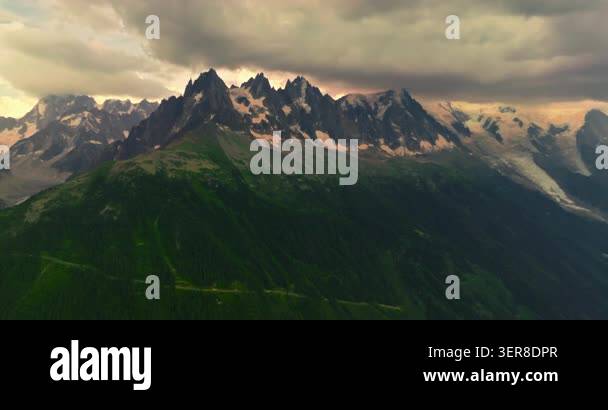 Establishing shot of French mountains in summer. Drone view of green ...