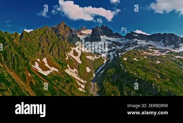 Establishing shot of Switzerland. Aerial view of the green meadows of ...