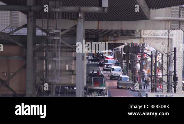 A cityscape of traffic jam at the downtown street in Ikejiri Tokyo ...
