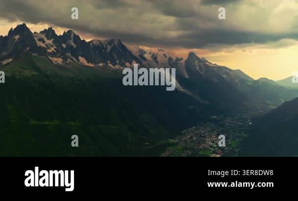 Establishing shot of French mountains in summer. Drone view of green ...