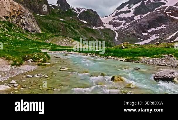 Establishing shot of Switzerland. Aerial view of the green meadows of ...