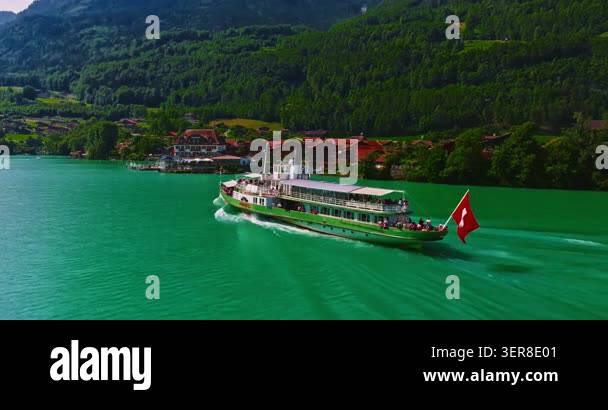 Aerial view of steamboat ship in lake with Swiss Flag. Beautiful Swiss ...