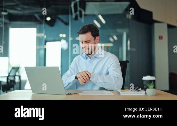 Corporate manager or IT specialist suffering from wrist ache, sprain or ...