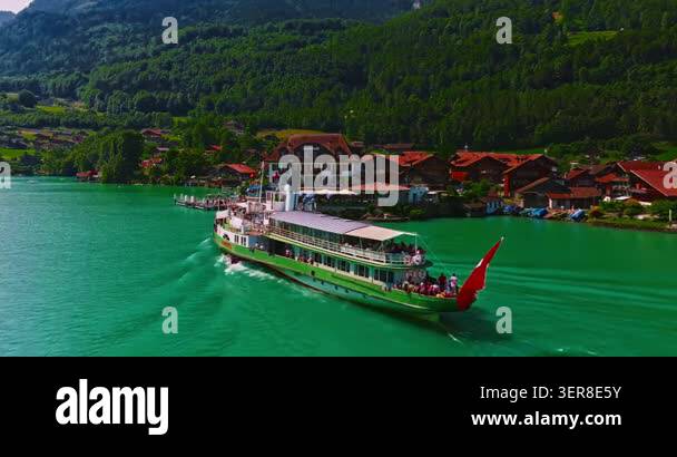 Aerial view of steamboat ship in lake with Swiss Flag. Beautiful Swiss ...