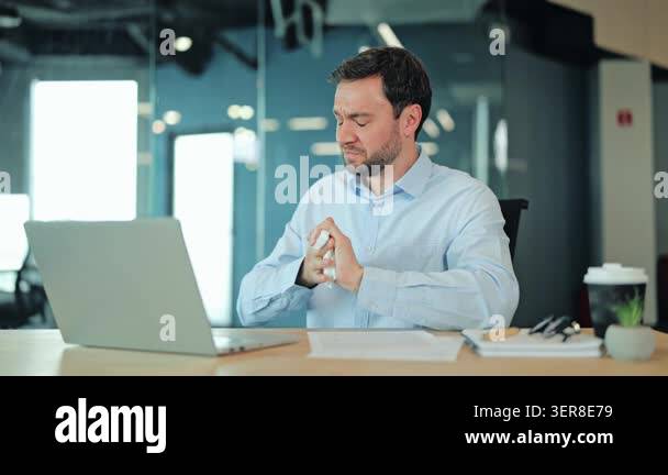 Close-up of unwell corporate manager or IT specialist suffering from ...