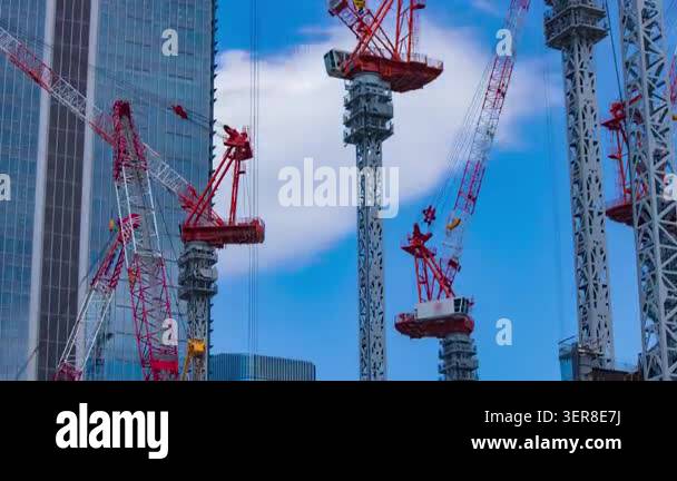 A timelapse of moving crane at the business town near Tokyo. High ...