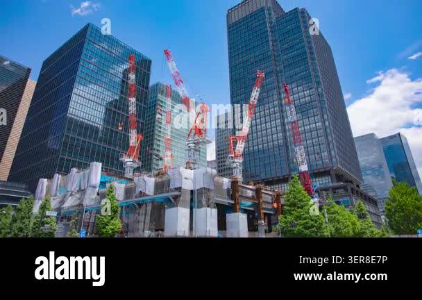 A timelapse of moving crane at the business town near Tokyo. High ...