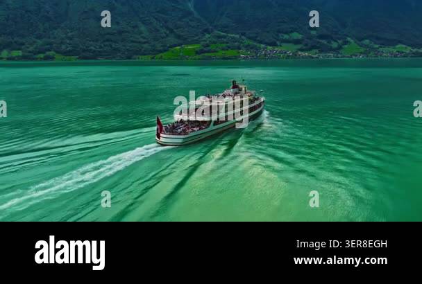 Establishing shot of Switzerland. Aerial view of the green meadows of ...
