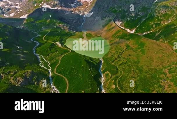 Establishing shot of Switzerland. Aerial view of the green meadows of ...