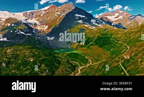 Establishing shot of Switzerland. Aerial view of the green meadows of ...