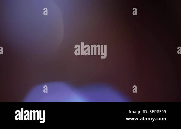 Blurred lights glow softly against dark background. Dreamy bokeh ...
