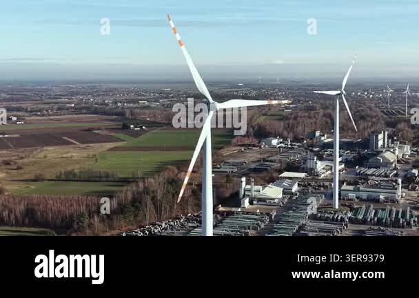 Wind farm overlooking town and agricultural land Stock Video Footage ...
