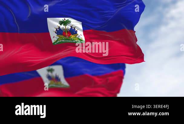 Haiti national flags waving on a clear day. Two horizontal bands of ...