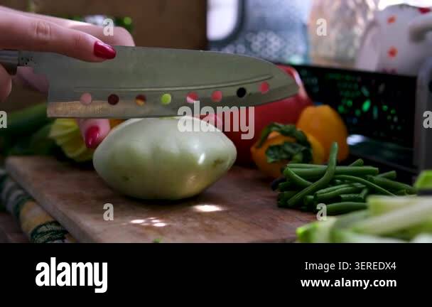 Warm sunlight highlights a cozy homemade vegan cooking process with ...