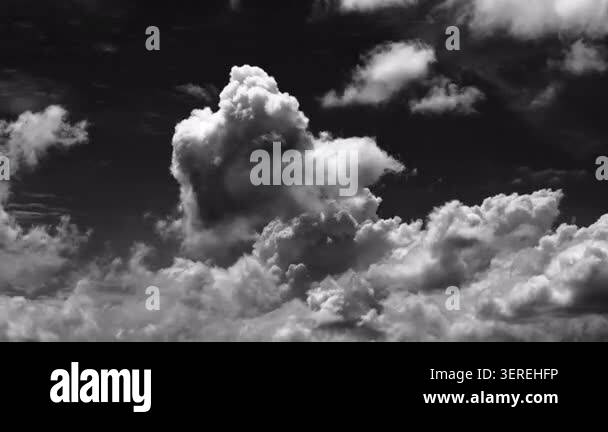 Time-lapse of floating white clouds creates a striking visual contrast ...