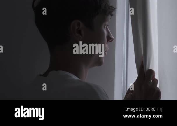 Surveillance and privacy fear concept with person secretly looking ...