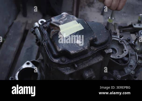old gear shift box from a front-wheel drive car installing cables and ...