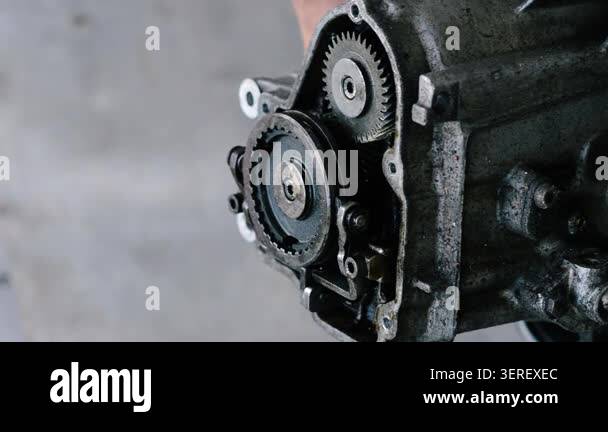 old gear shift box from a front-wheel drive car installing cables and ...