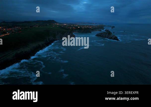 Drone panorama of rugged coastal cliffs and offshore rocks near ...