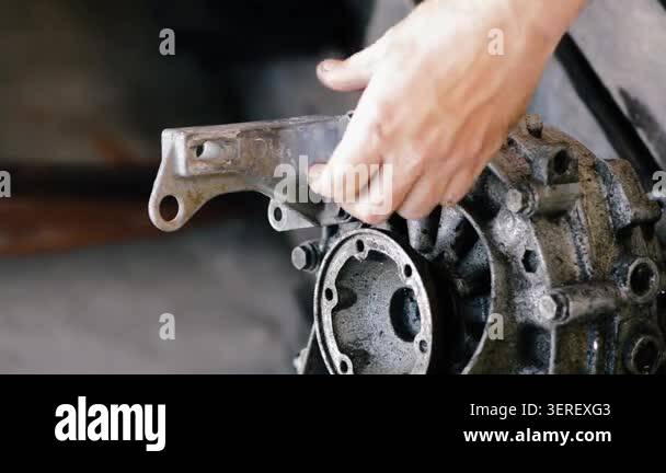 old gear shift box from a front-wheel drive car installing cables and ...