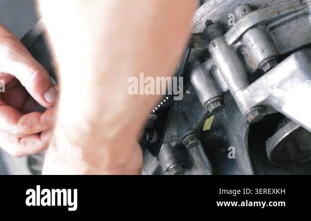 old gear shift box from a front-wheel drive car installing cables and ...