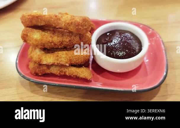 Crispy chicken nuggets with barbecue dipping sauce Stock Video Footage ...