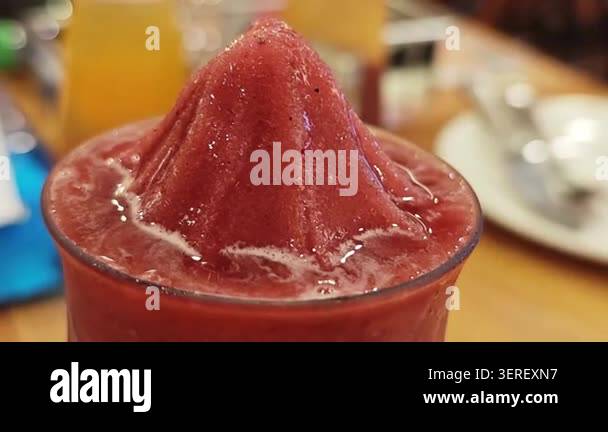 Close up of red berry smoothie frappe Stock Video Footage - Alamy