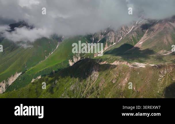Beautiful aerial drone scenery of the mountain valley with spruce ...