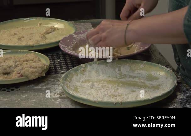 woman in the kitchen placing ingredients for food in tagine Stock Video ...