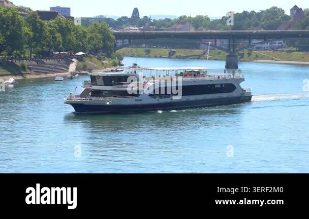 Basel, Switzerland, May 24, 2026: River cruise vessel moves smoothly ...