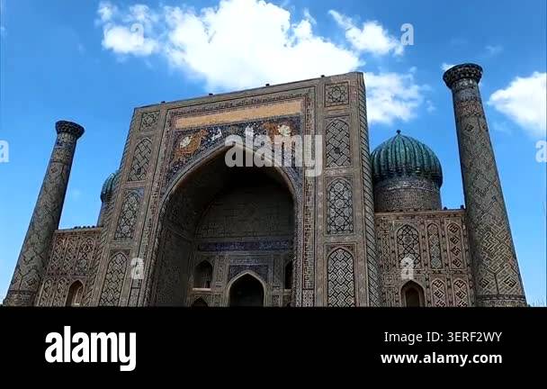 SAMARKAND, UZBEKISTAN - MAY 6, 2022: A 4K static wide shot of Registan ...