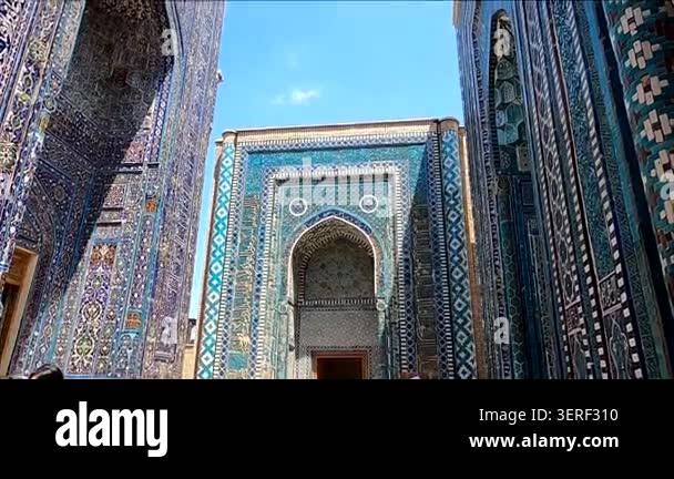 SAMARKAND, UZBEKISTAN - MAY 6, 2022: A 4K low-angle tilt-up shot of the ...