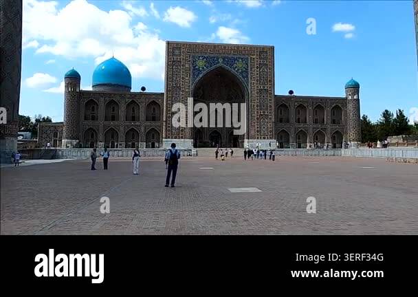 SAMARKAND, UZBEKISTAN - MAY 6, 2022: A 4K static shot of the Tilya-Kori ...
