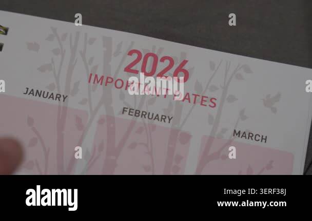 finger pointing at 2026 planner page close up for annual planning ...