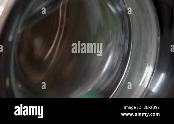 spinning washing machine drum detail, fast rotation background for ...