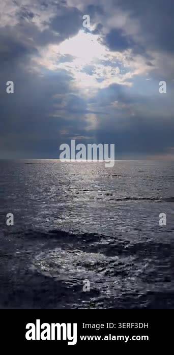 Rain in sea. Rain falling in sea. Cloudy, rainy, stormy weather at sea ...
