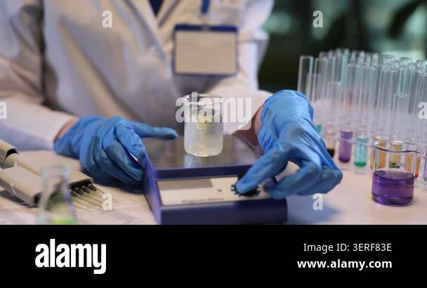 Female chemist uses vibrator to stir oil and water in research lab ...