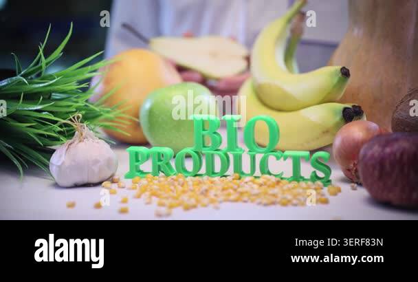 Bio Products text against fresh fruits and vegetables on doctor desk ...