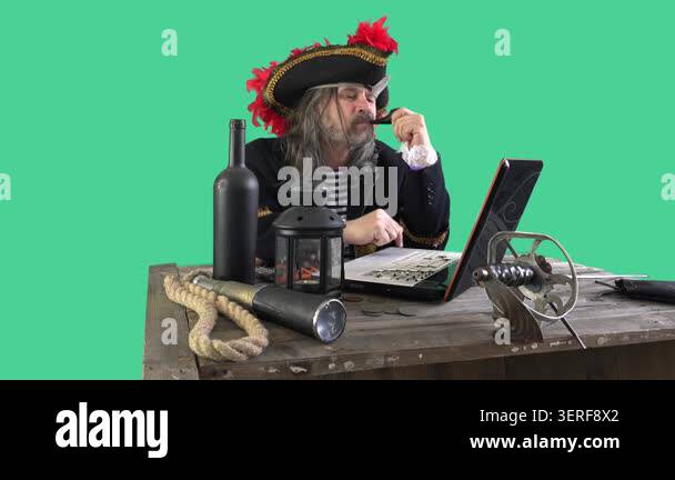 Elderly pirate types on a laptop with one finger, pipe in mouth, then ...