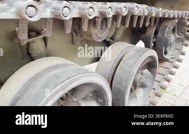 Detailed views of an old tracked military vehicle on display as a park ...