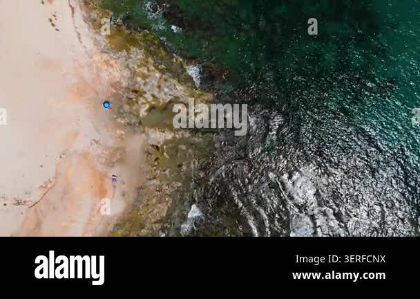Aerial top view serene sandy beach and clear turquoise Mediterranean ...