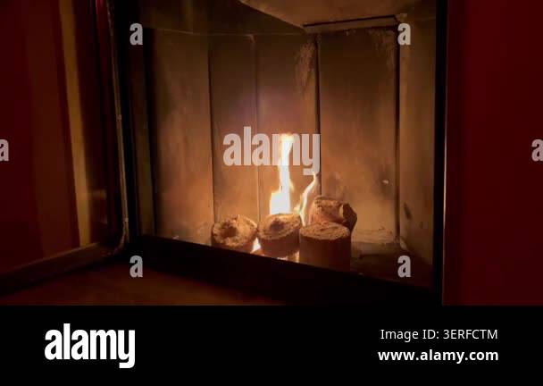 Glowing Fire in Wood Burning Fireplace Producing Warm Light During Cold ...