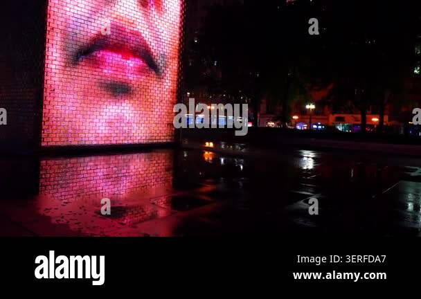 Night close up of illuminated face on fountain, Chicago, Illinois ...