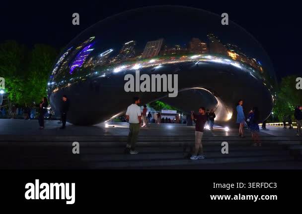 Chicago, USA, 7 May 2026: Frontal view of curved reflective sculpture ...