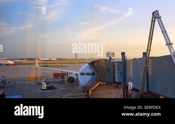 Chicago, USA, 7 May 2026: Commercial airplane parked at a terminal gate ...