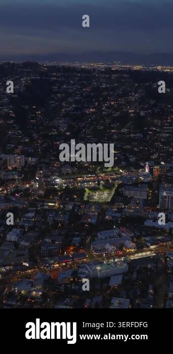 Aerial ascending footage of residential urban neighbourhood in hills ...