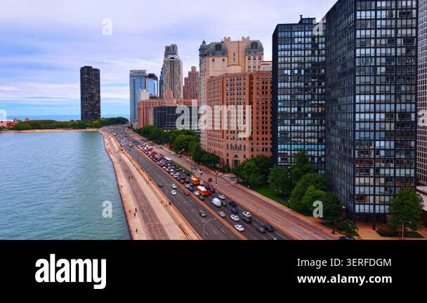 Traffic congestion on the road along Lake Michigan. Iconic Oak Street ...