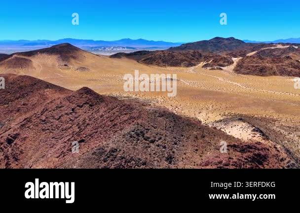Hot desert with rocks from drone footage. Arid landscape against ...